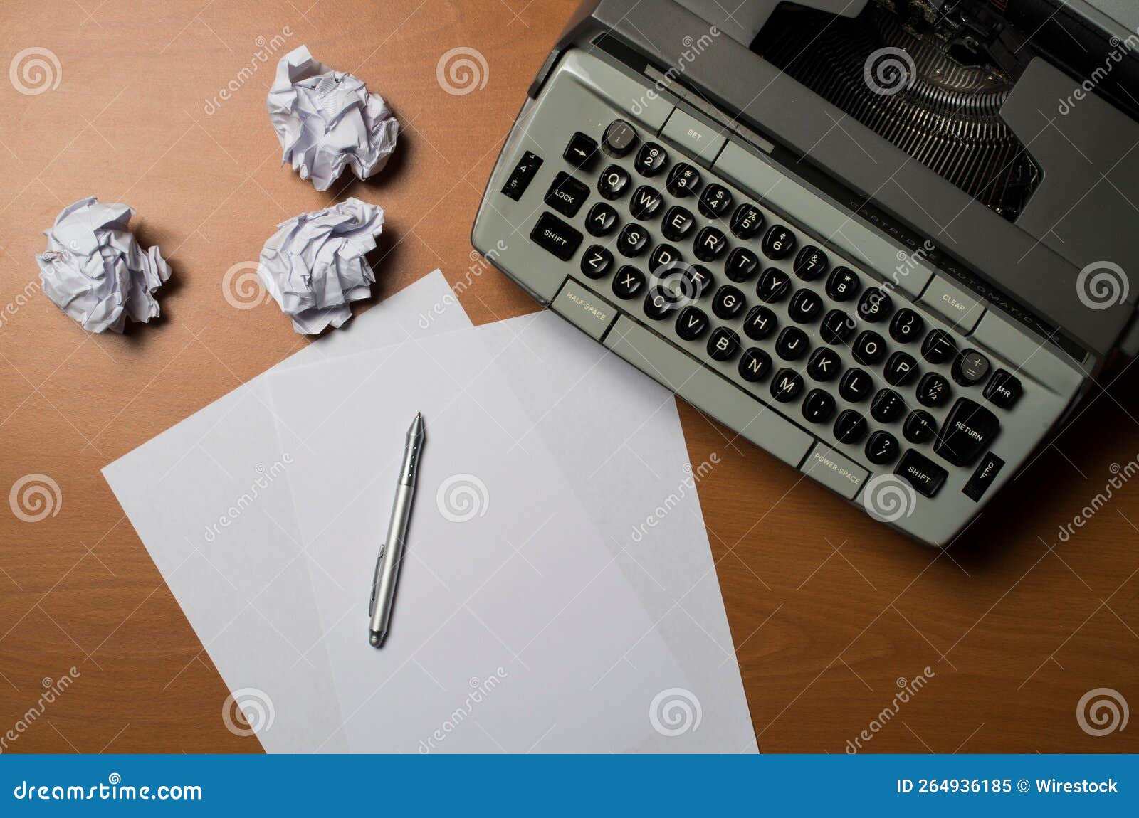 Closeup of a Typewriter with Blank Papers and a Pen. Concept of ...