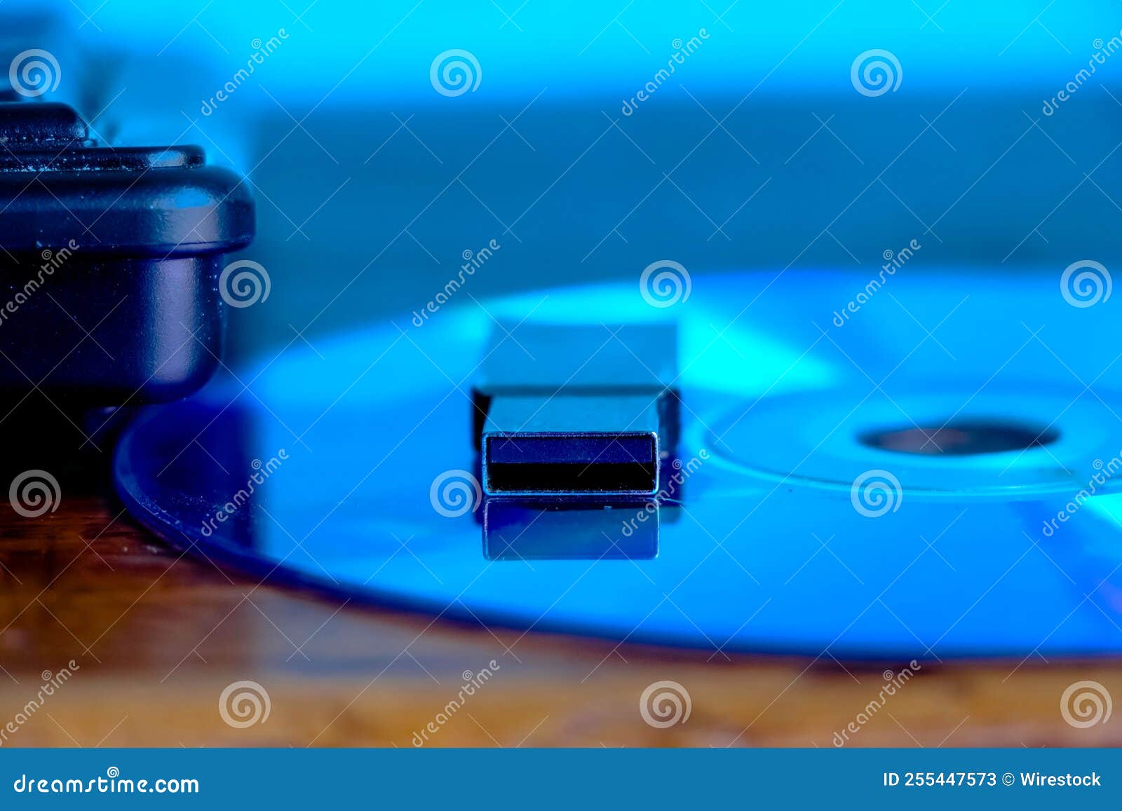 Closeup of a Usb Flash Drive on a Disc Against a Blue Light. Stock ...