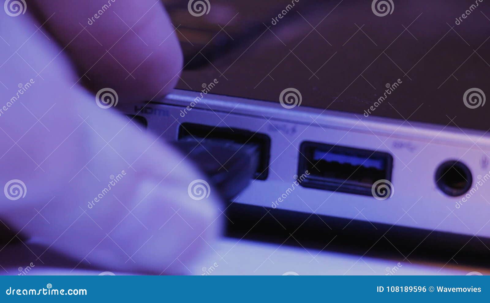 Closeup of USB Flash Drive Inserted into Port on the Side of a L Stock ...