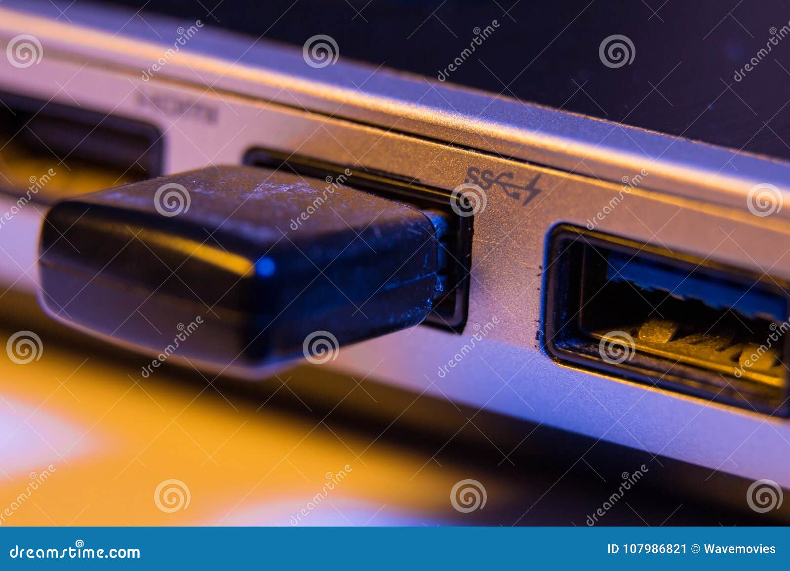 Closeup of USB Flash Drive Inserted into Port on the Side of a L Stock ...