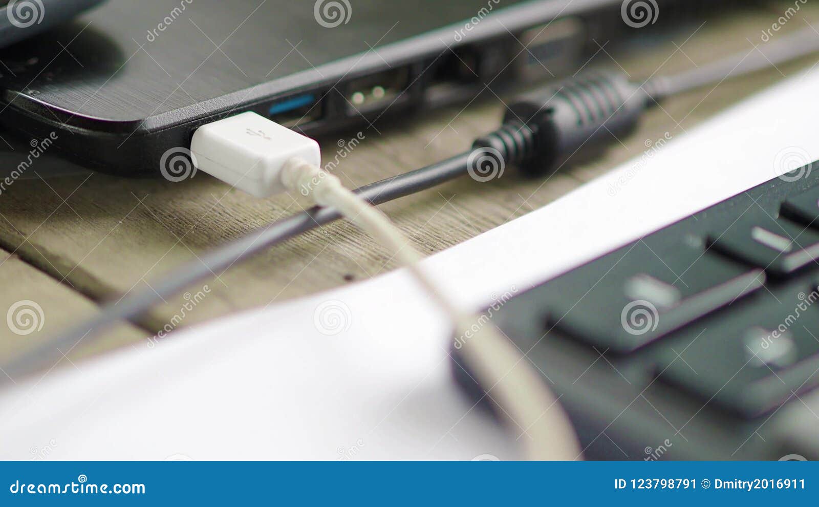 Closeup of USB Flash Drive Inserted into Port on the Side of a Laptop ...