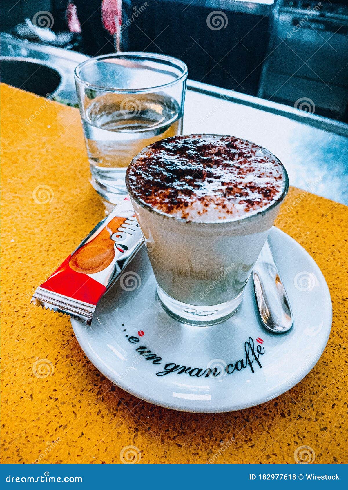 Closeup Vertical Shot of a Cup of Coffee and a Glass of Water Stock ...