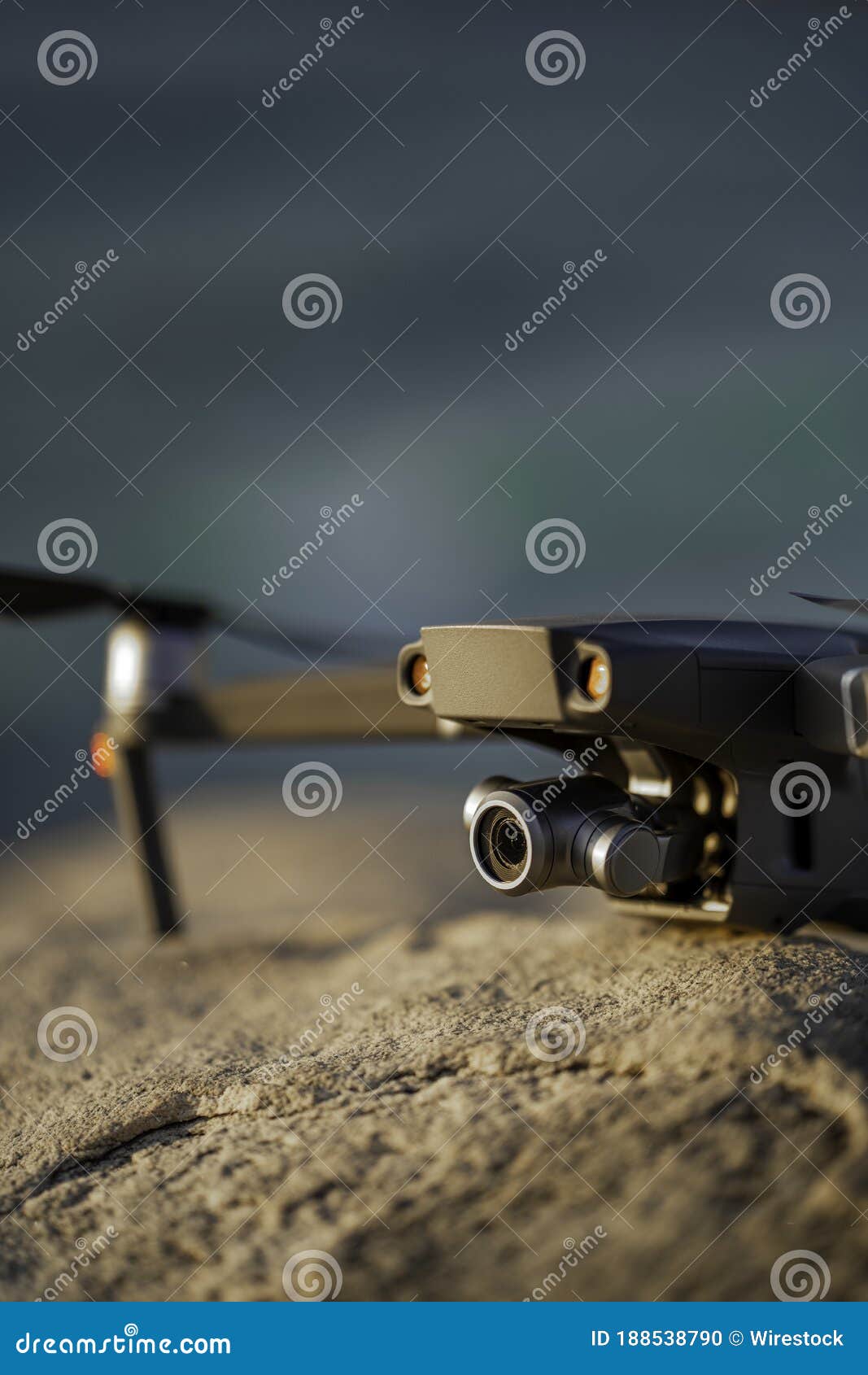 Closeup Vertical Shot of a Drone with a Camera on a Rocky Surface Stock ...