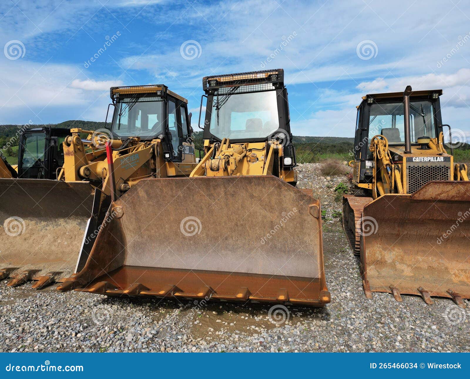 Closeup View of Backhoe Loaders on a Gravel Road Editorial Stock Image ...