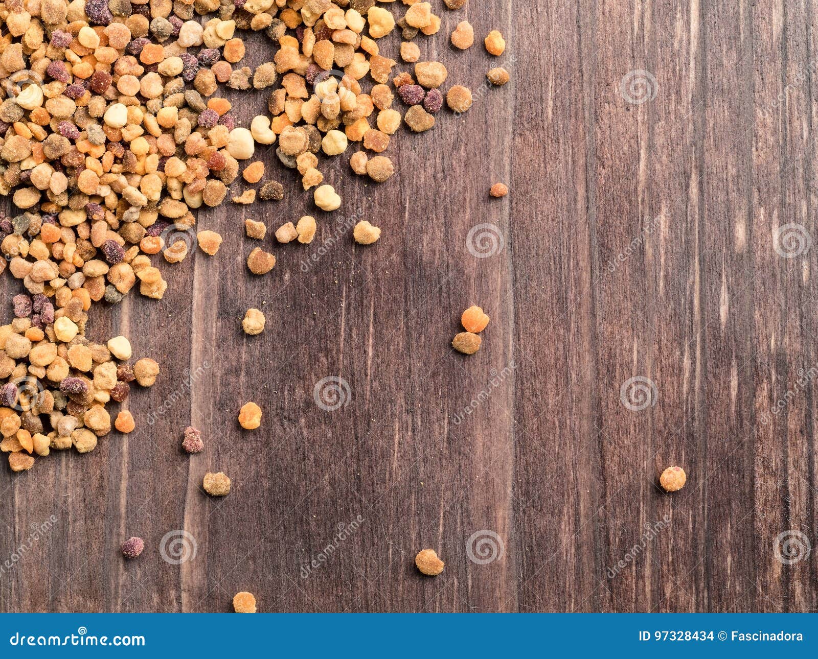 Closeup View of Bee Pollen on Brown Wooden Table Stock Photo - Image of ...