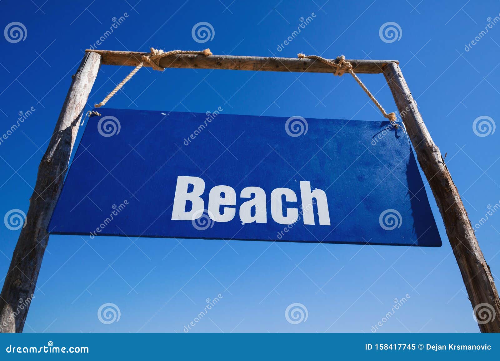 Blue Board with Beach Title Stock Image - Image of coastal, still ...