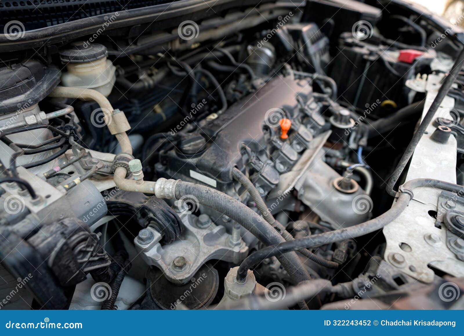 Closeup View of a Car Engine with Various Component and Wire Visible ...