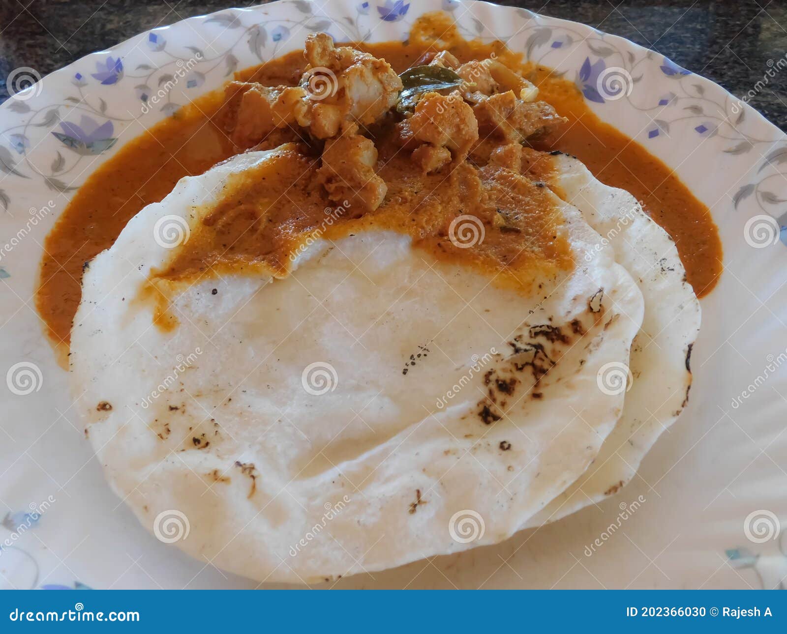 Closeup View of Dish Rice Rotti with Chicken Curryin a Plate Stock ...