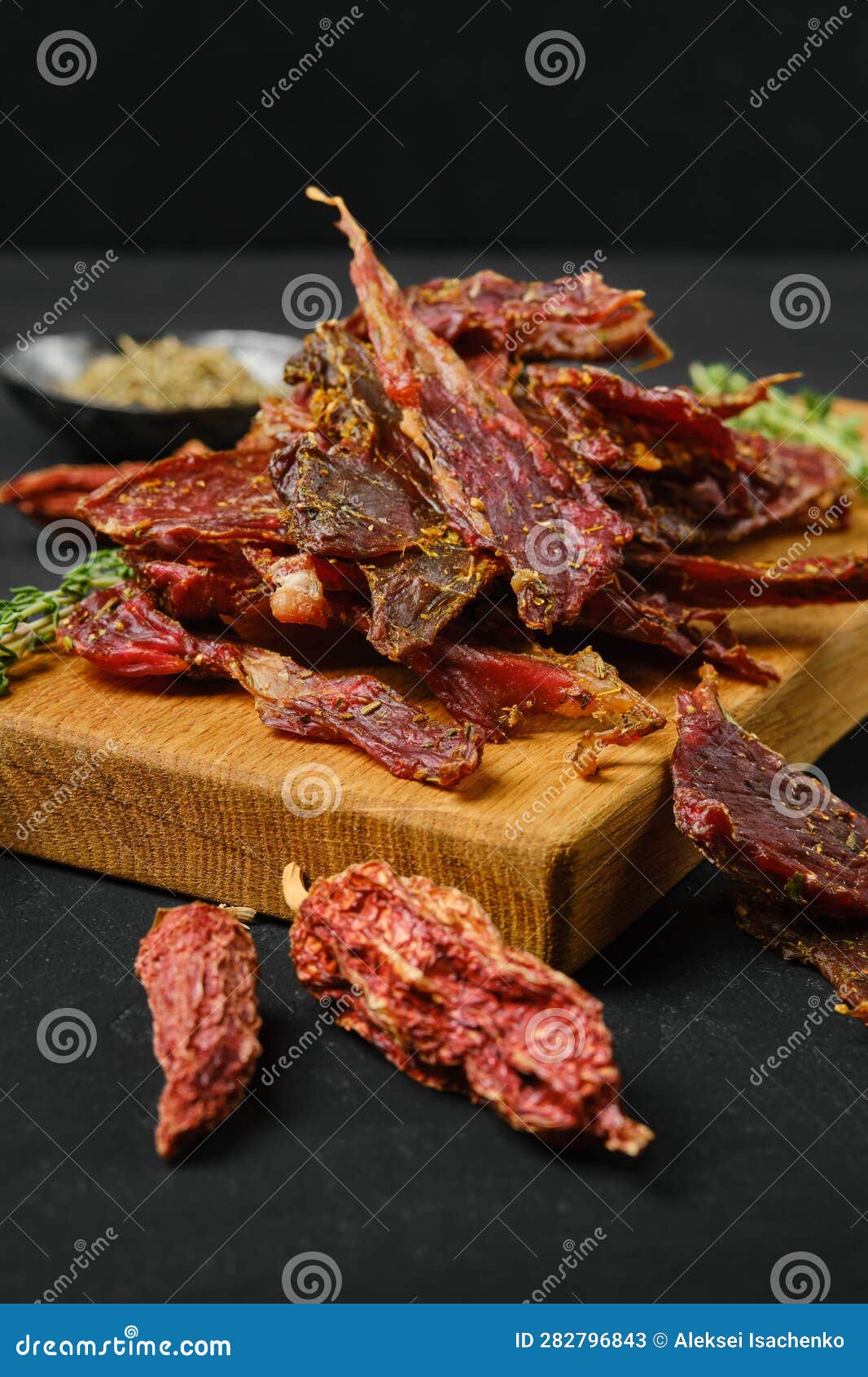Closeup View of Dried Lamb Jerky Slices with Salt and Chilli Pepper ...
