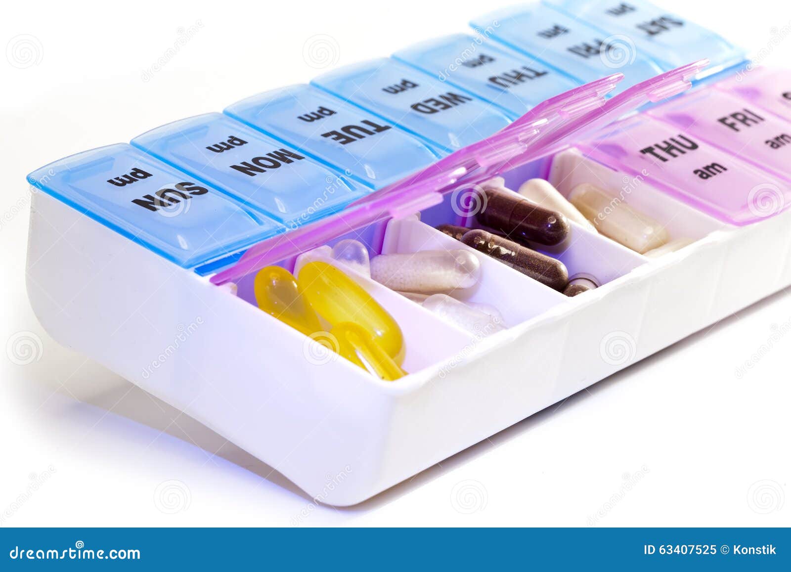 Closeup View of Drugs in a Box with Small Separations for Each Day of ...