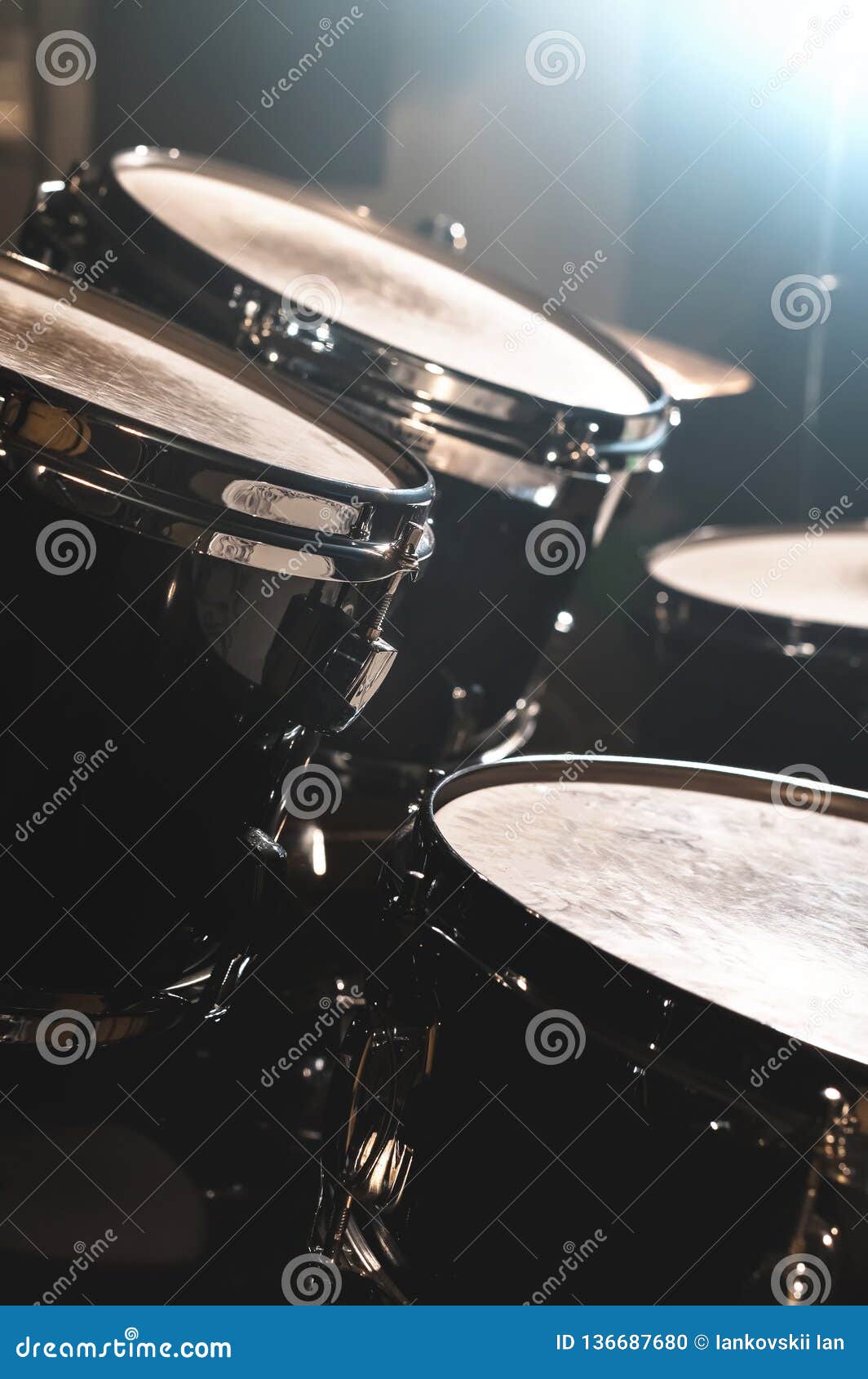 Closeup View of a Drum Set in a Dark Studio. Black Drum Barrels with ...