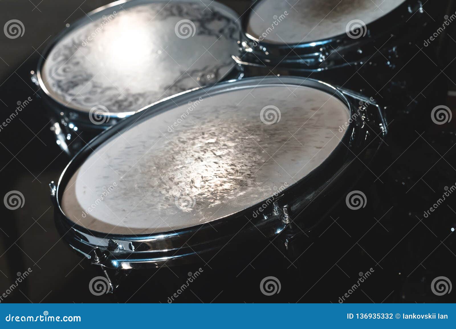Closeup View of a Drum Set in a Dark Studio. Black Drum Barrels with ...