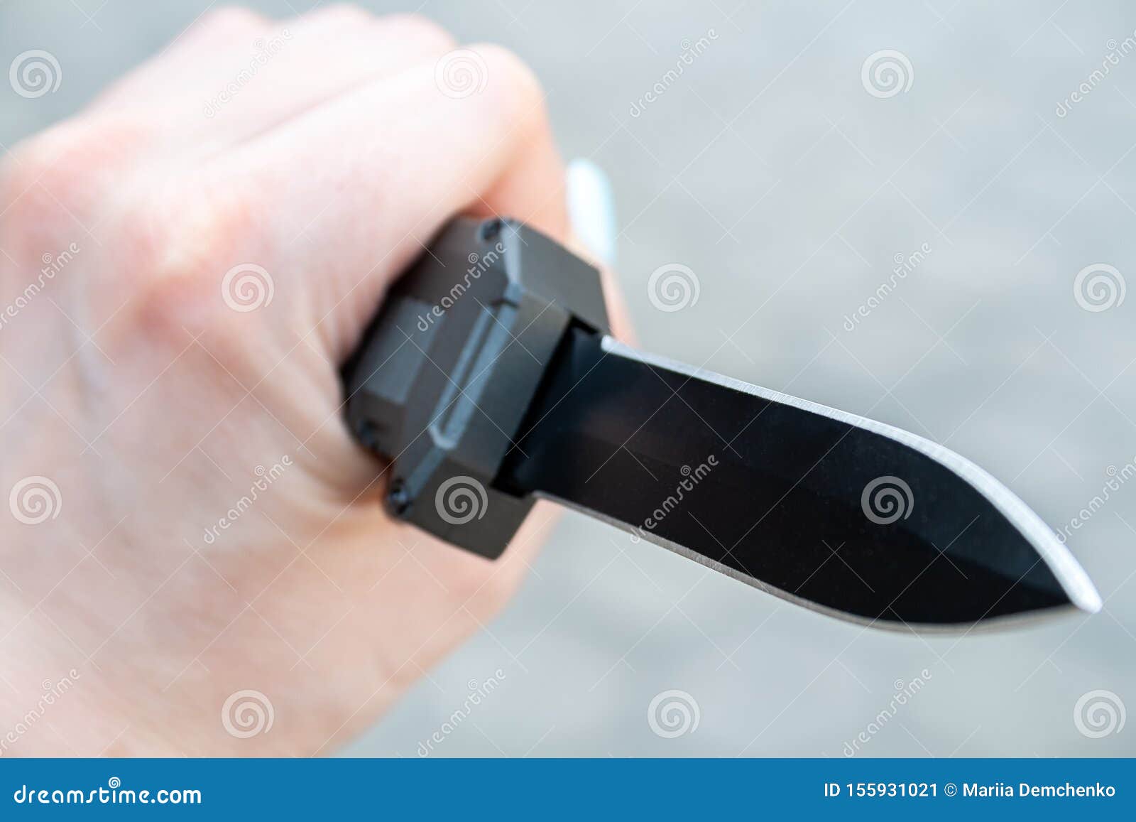 Closeup View of a Female Hand with a Black Pocket Folding Knife Blade ...