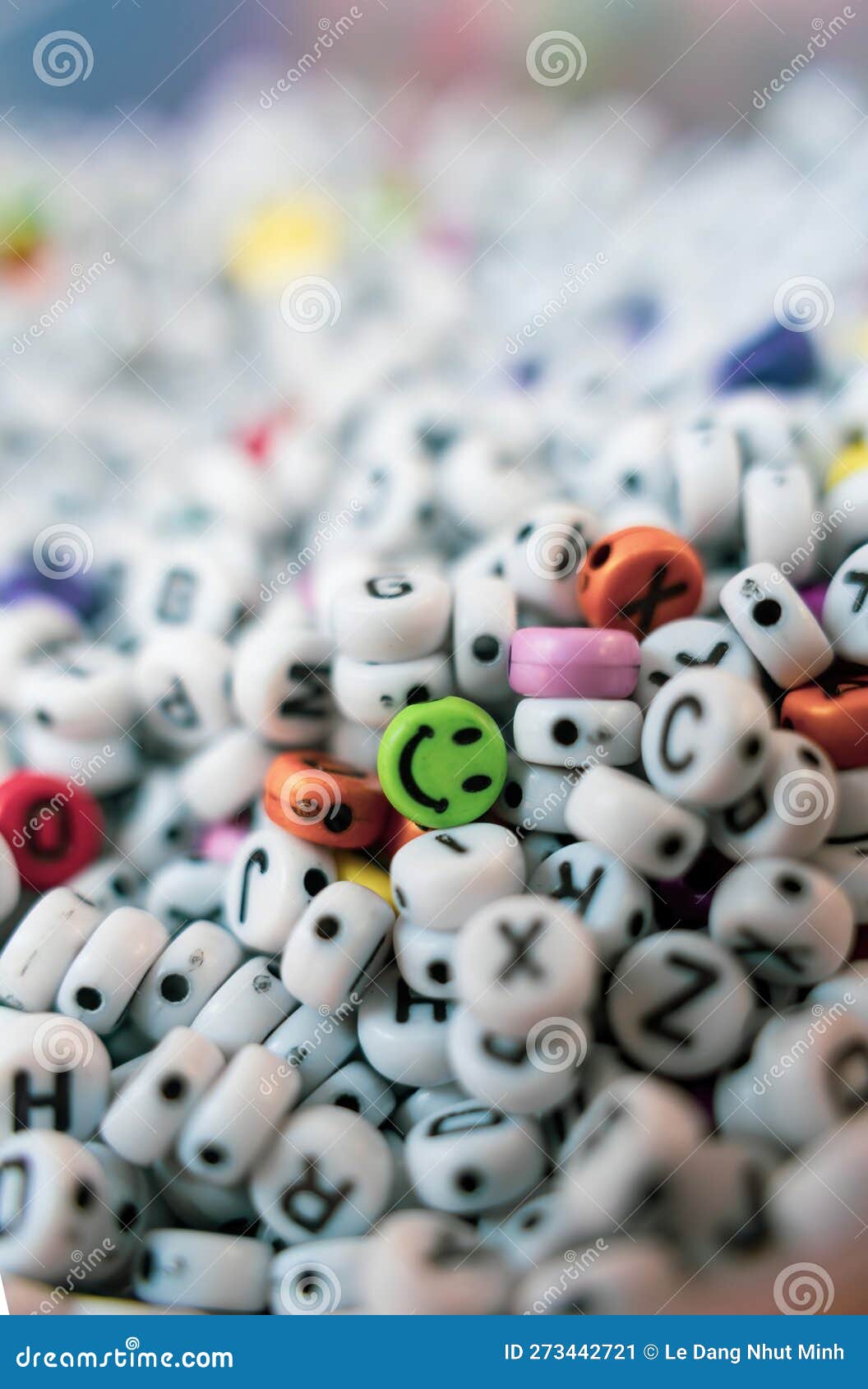Closeup View of a Green Smiley Face on a Bunch of Letter Cubes Stock ...