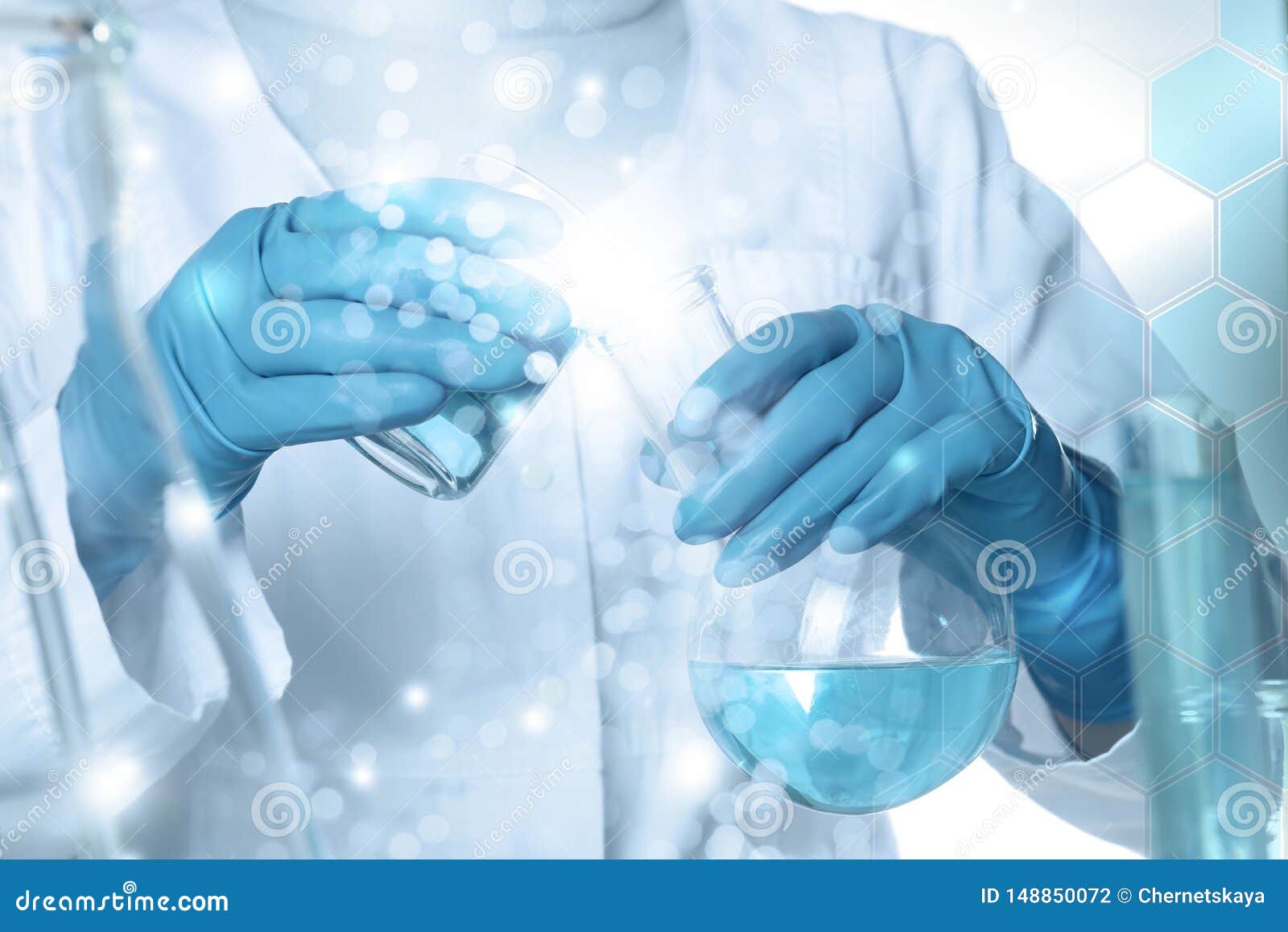 Closeup View of Scientist Pouring Color Liquid from Beaker into Flask ...