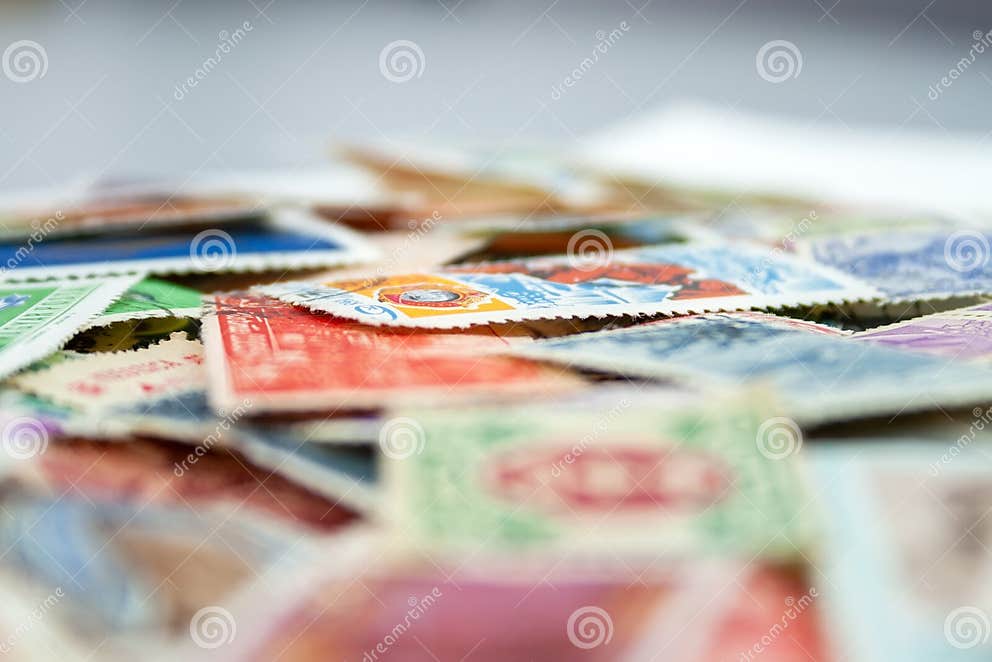 Closeup View on a Variety of Multi-colored Postage Stamps from ...