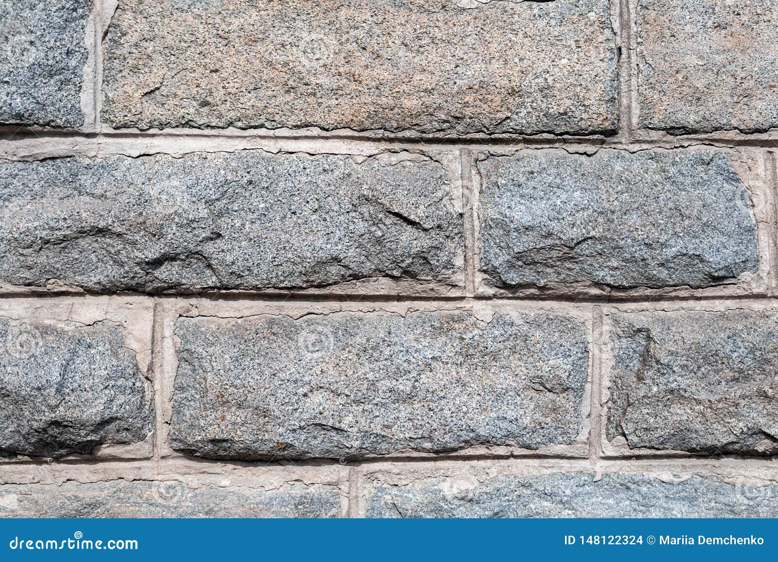 Closeup View of a Wall of Rough Granite Bricks with Cement Grout ...