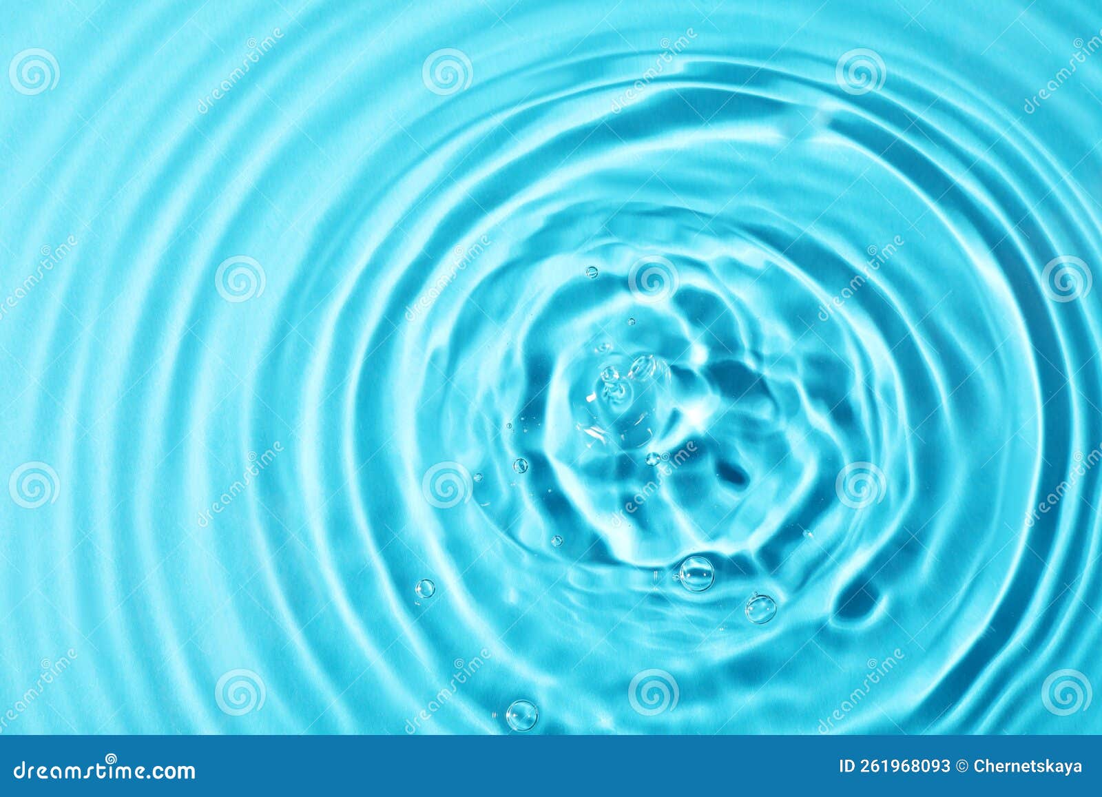 Closeup View of Water with Rippled Surface on Light Blue Background ...