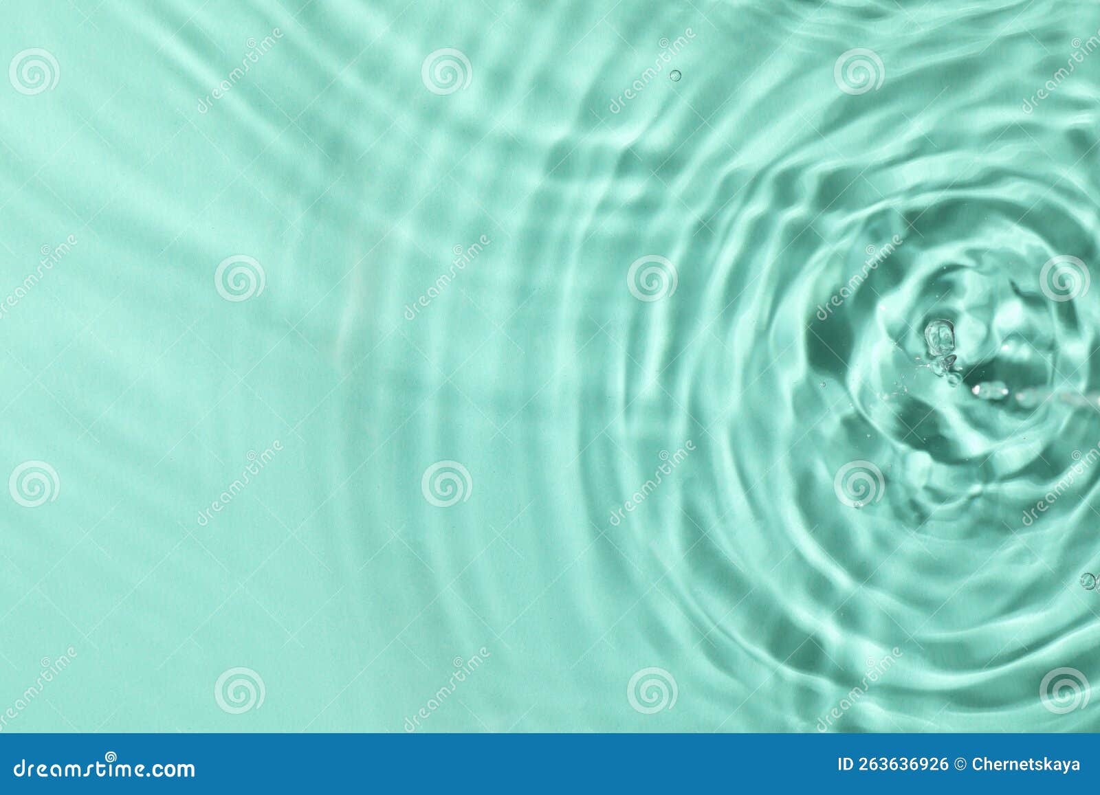 Closeup View of Water with Rippled Surface on Light Blue Background ...