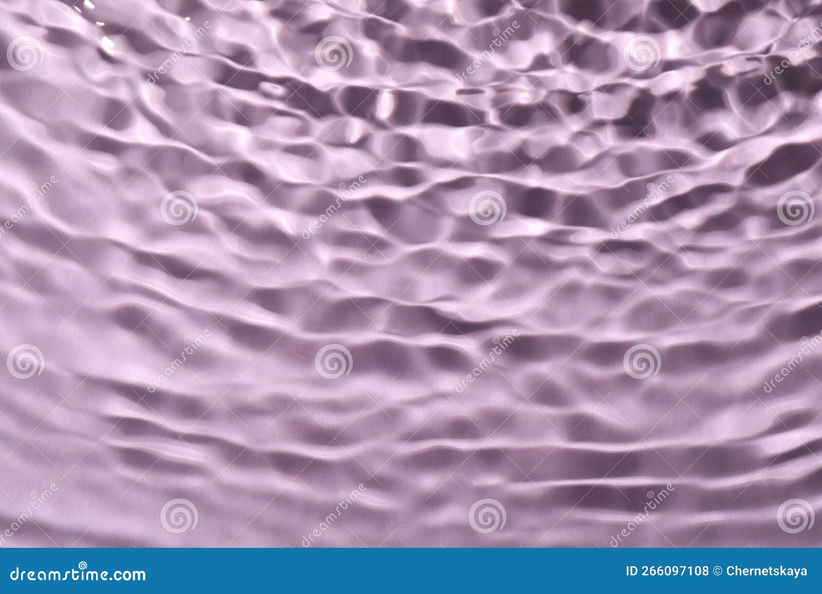 Closeup View of Water with Rippled Surface on Violet Background Stock ...