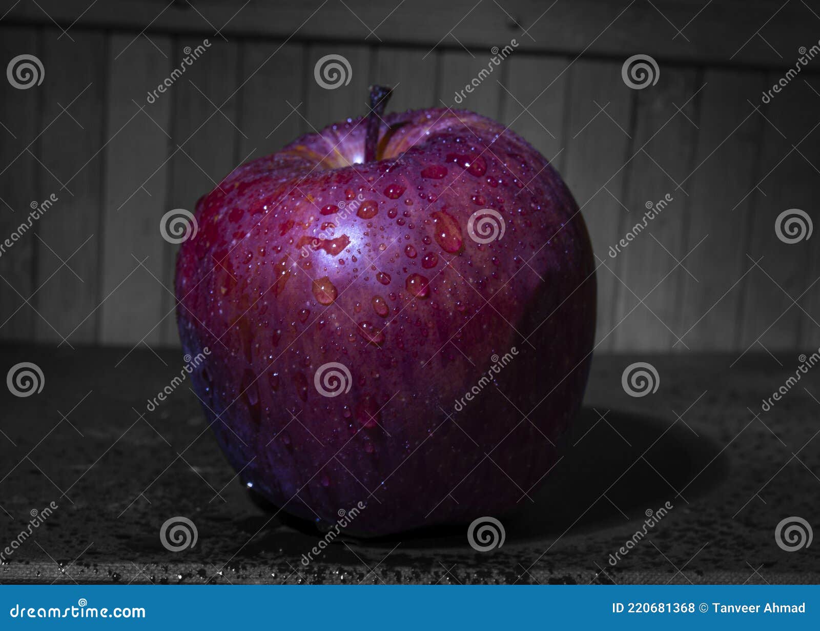 Closeup View of Wet Apple with Wood Background Stock Photo - Image of ...