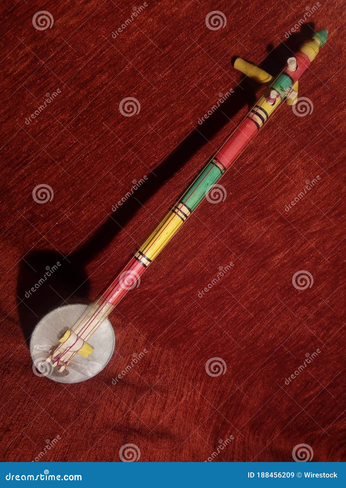 Closeup of a Vintage Moroccan Lute Instrument on a Red Surface Stock ...