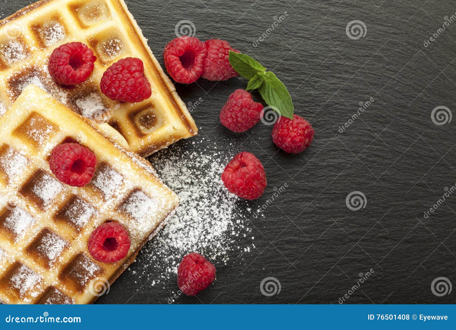 Closeup of Waffles with Raspberries on Black Slate Stock Photo - Image ...