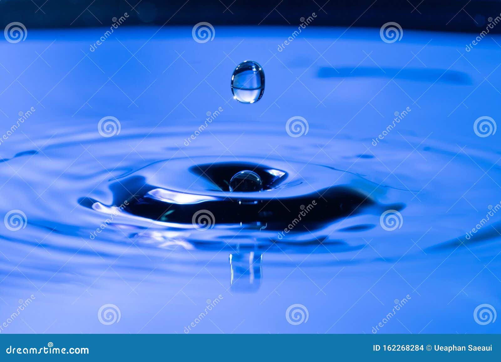 Closeup Water Drop Falling Multi Color. Water Drop Splash and Make ...