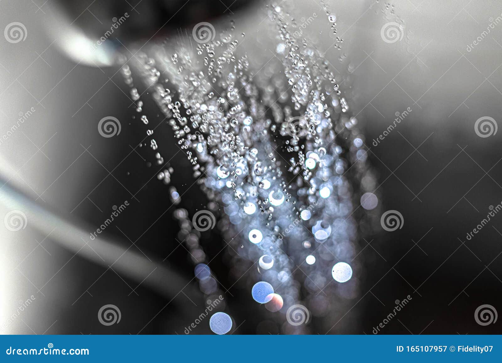 Closeup of Water Drops Running from the Shower Head in the Bathroom ...