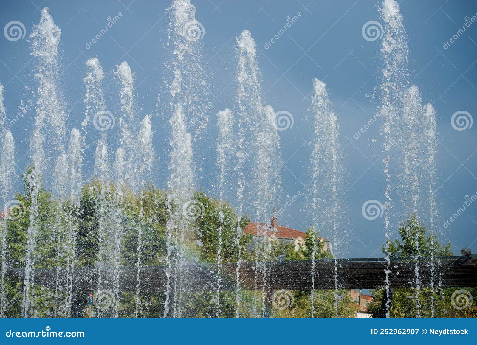 Water Jets in a Public Square in the Street Stock Image - Image of ...