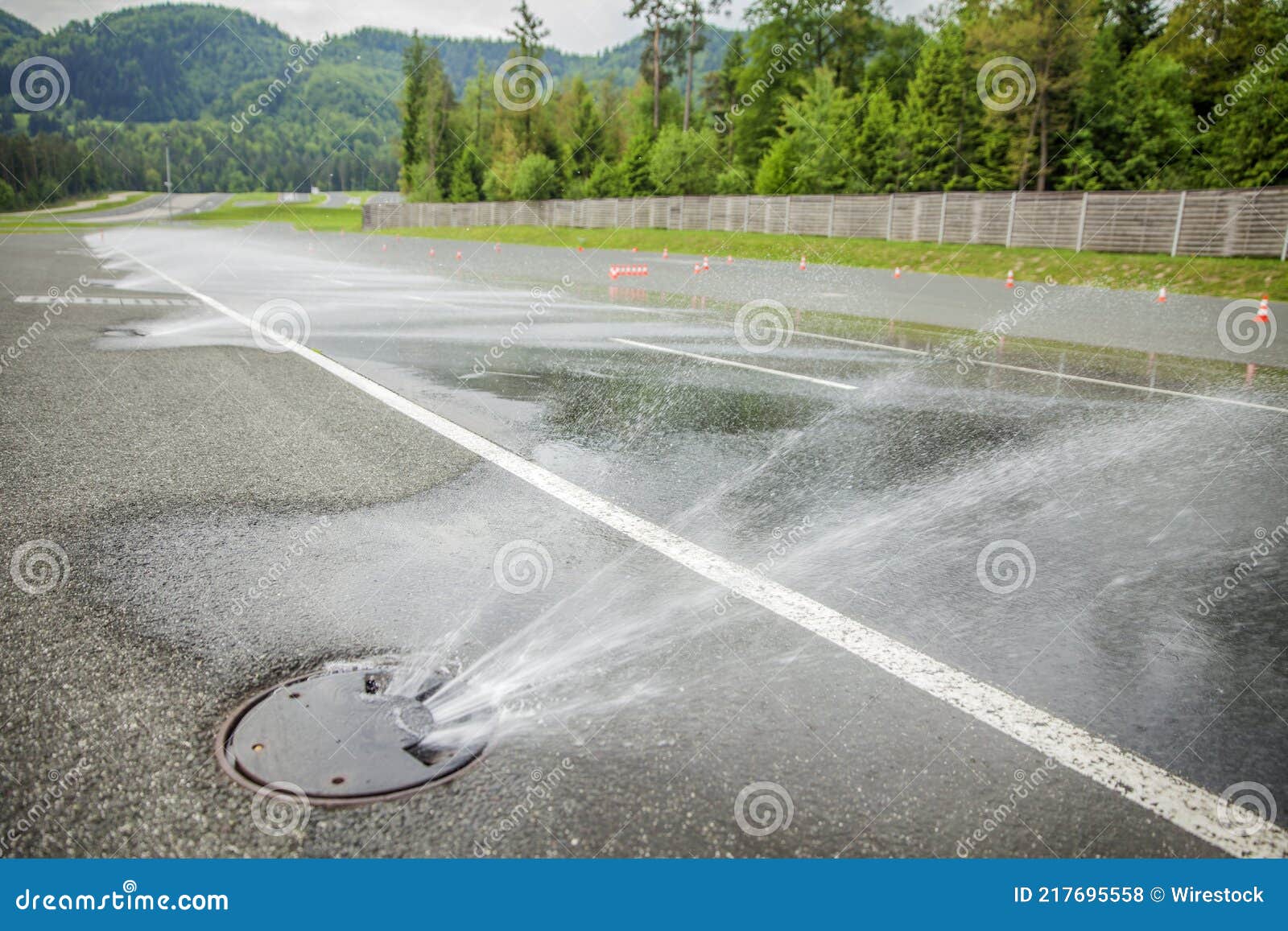 Closeup of Water Road Sprinkler Stock Photo - Image of horizontal ...