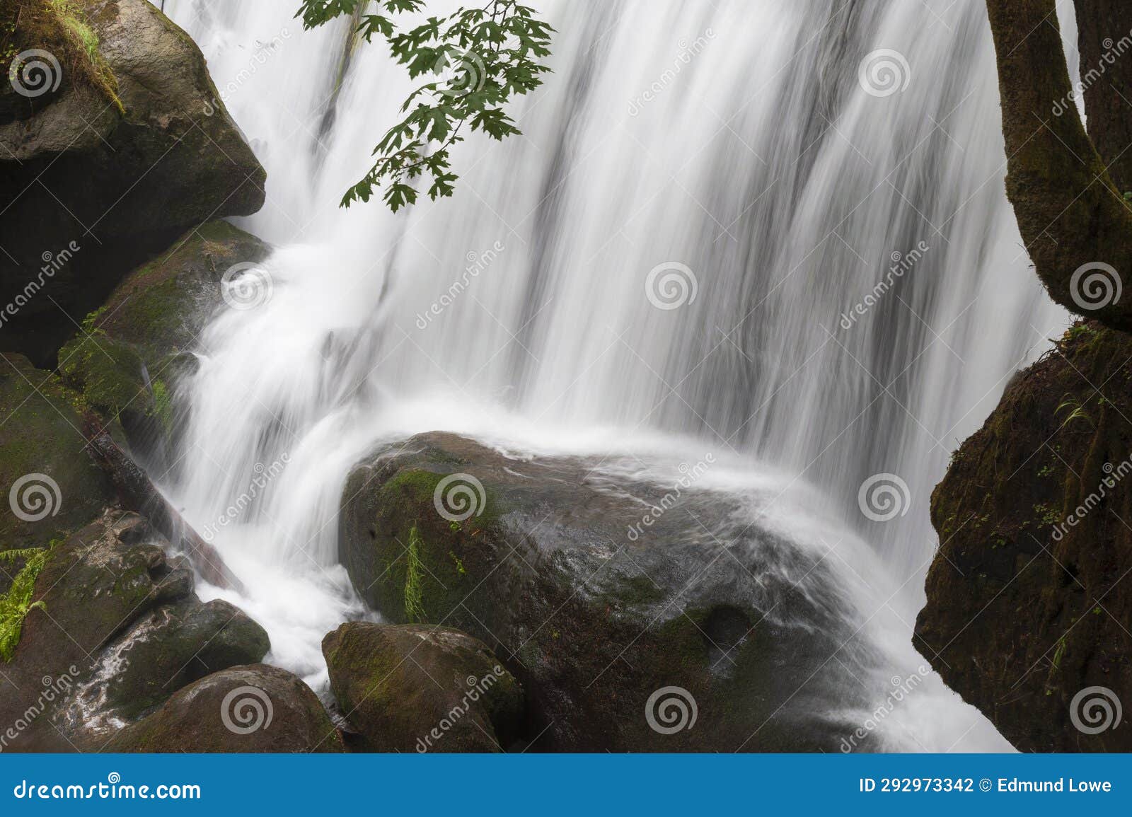 Closeup of a Waterfall Splashing on a Large Rock. Stock Photo - Image ...