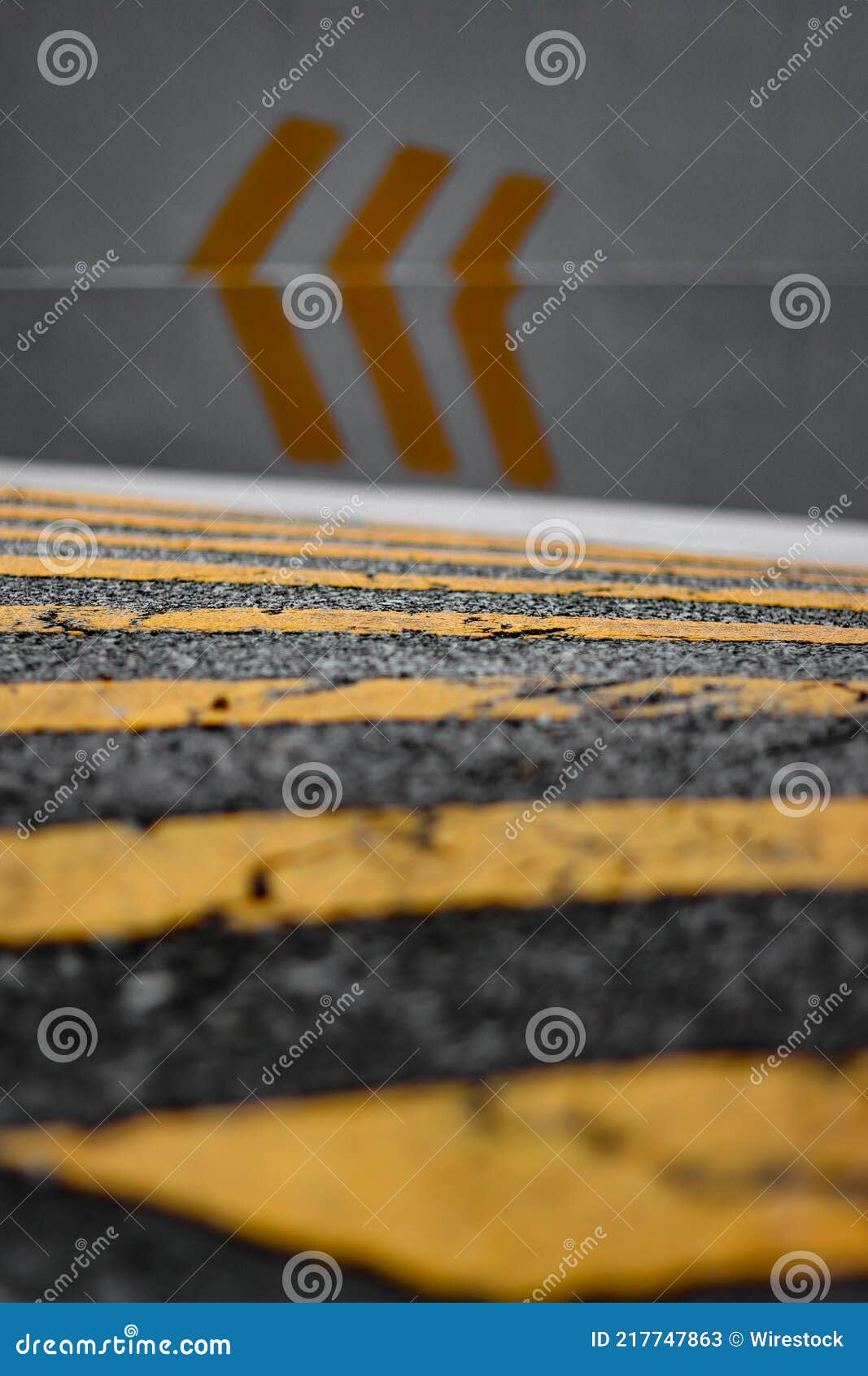 Closeup of the Weathered and Old Diagonal Yellow Lines on the Asphalt ...