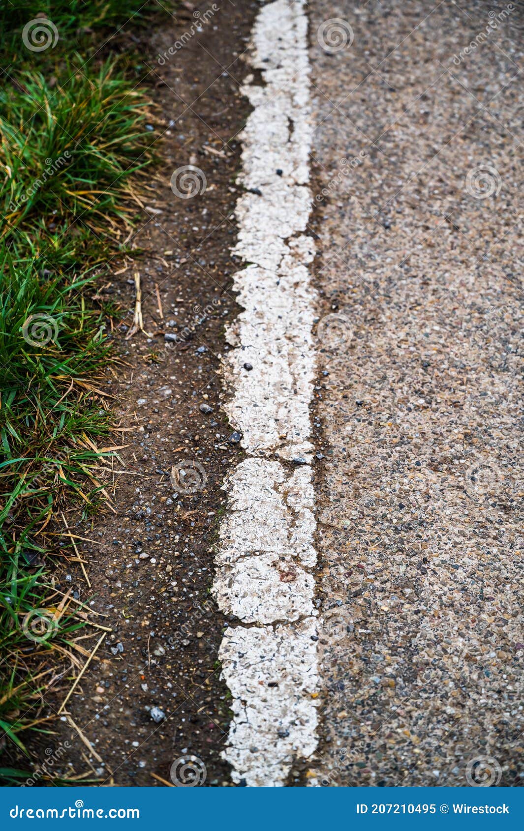 Closeup of the Weathered White Line on the Asphalt Road Surrounded by ...