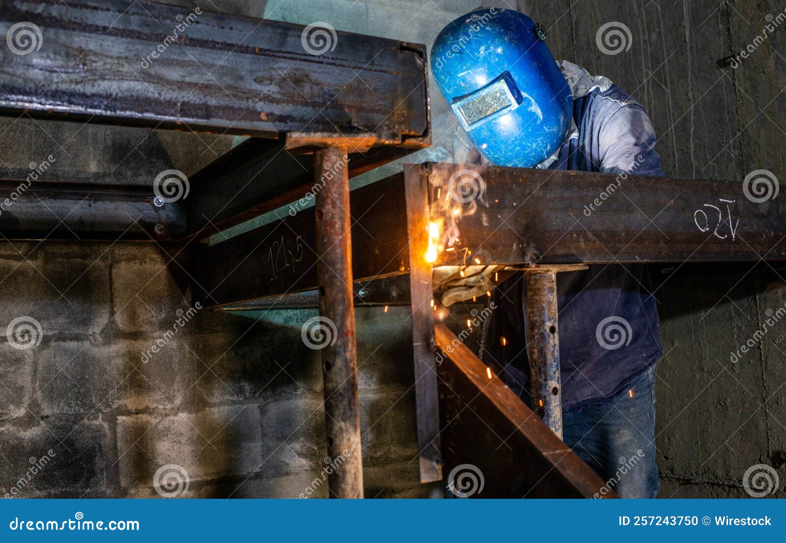Closeup Welder Working Welding Assembly Structure Between Ground Beam ...