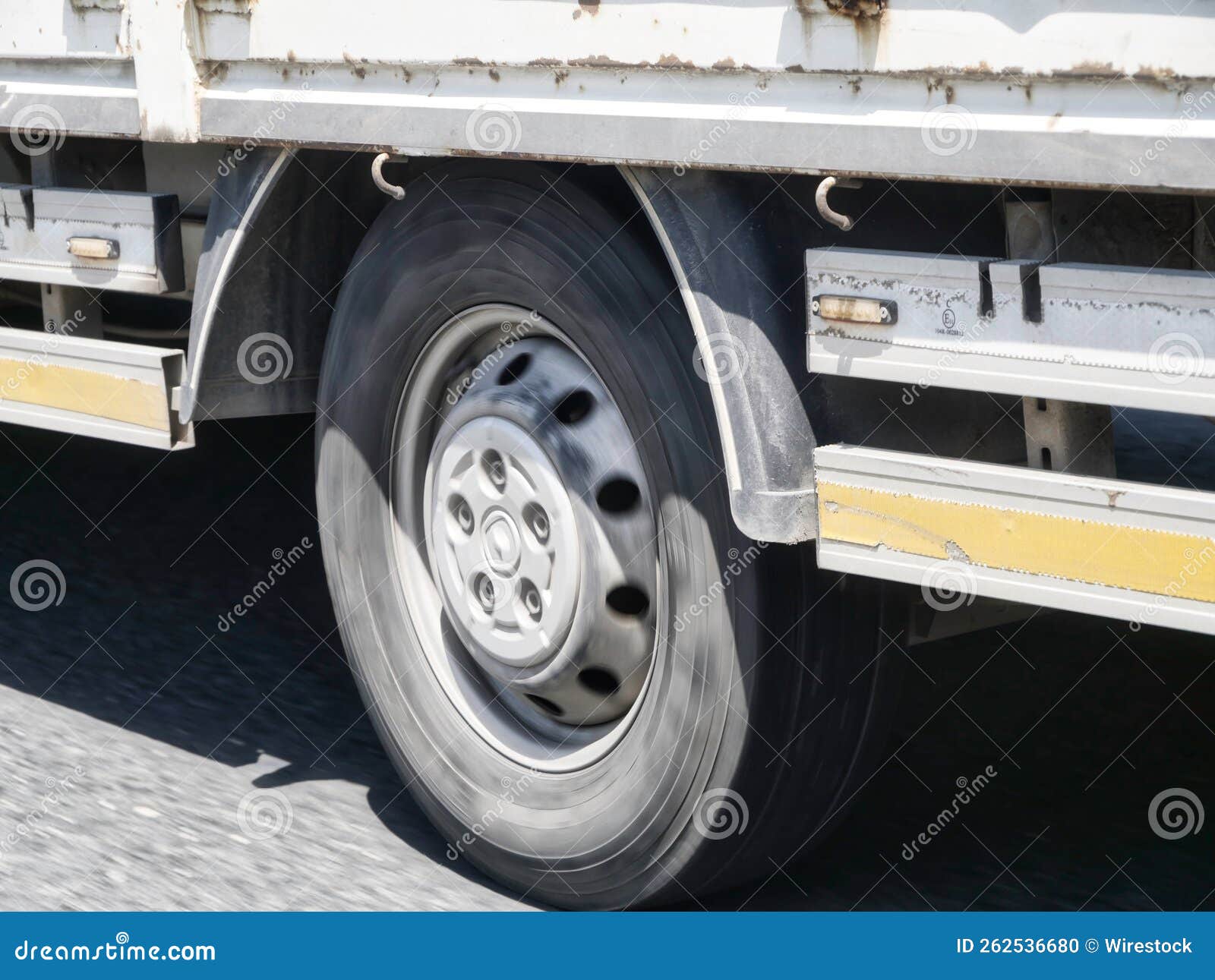Closeup of a Wheel of Running Truck on the Road Stock Photo - Image of ...