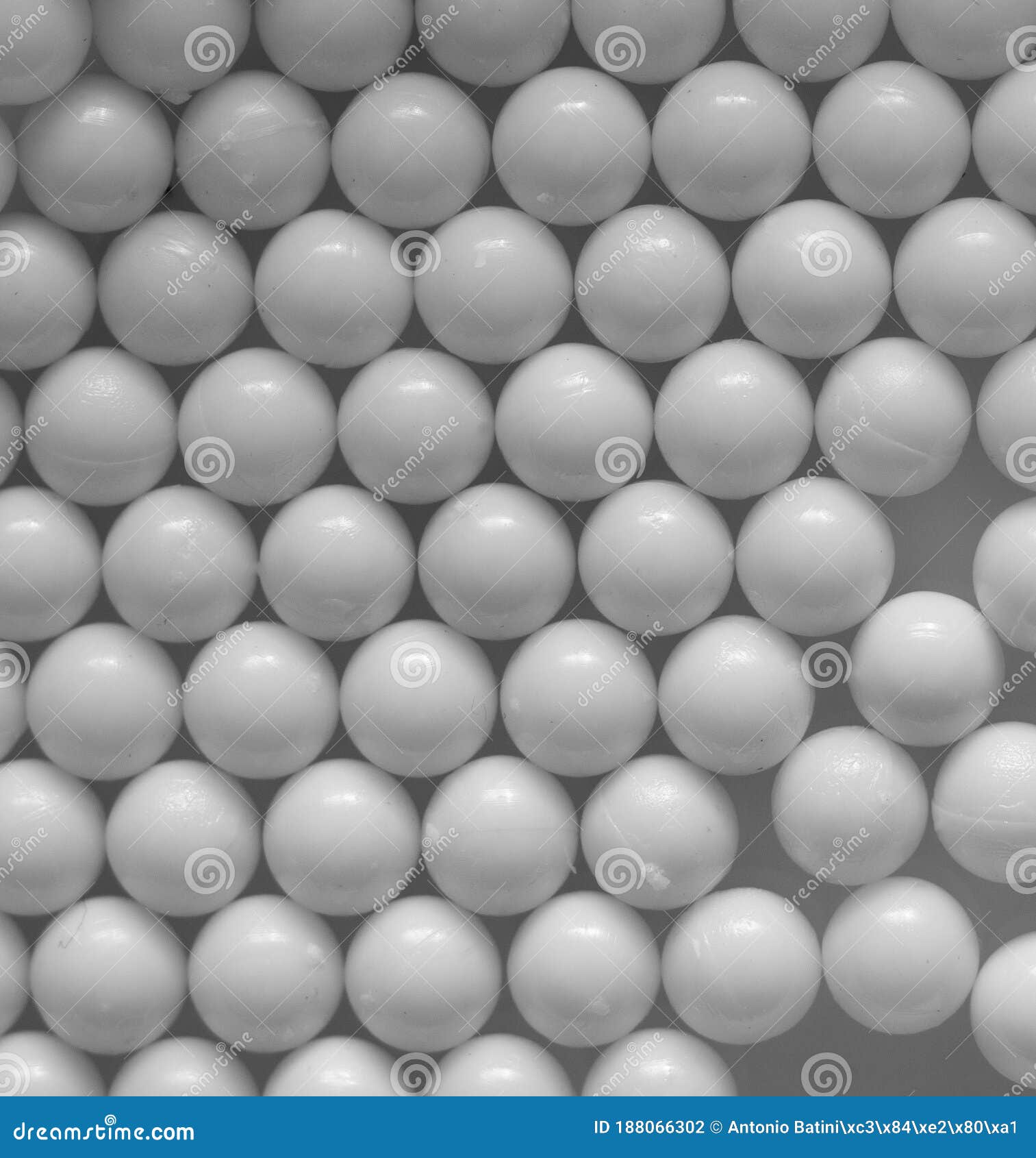 Closeup of White Plastic Bb`s Lined Up on Flat Background Stock Photo ...