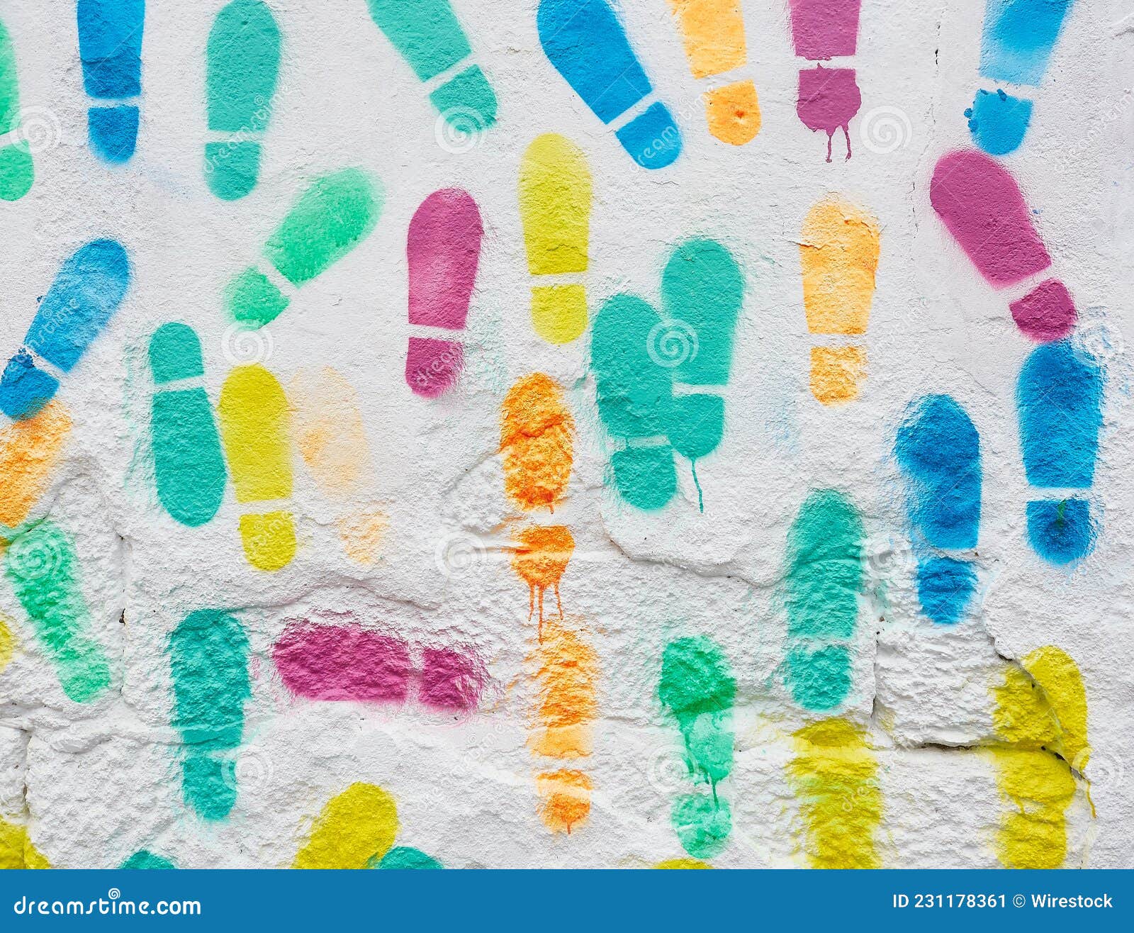 Closeup of a White Wall with Colorful Footsteps Stock Image - Image of ...