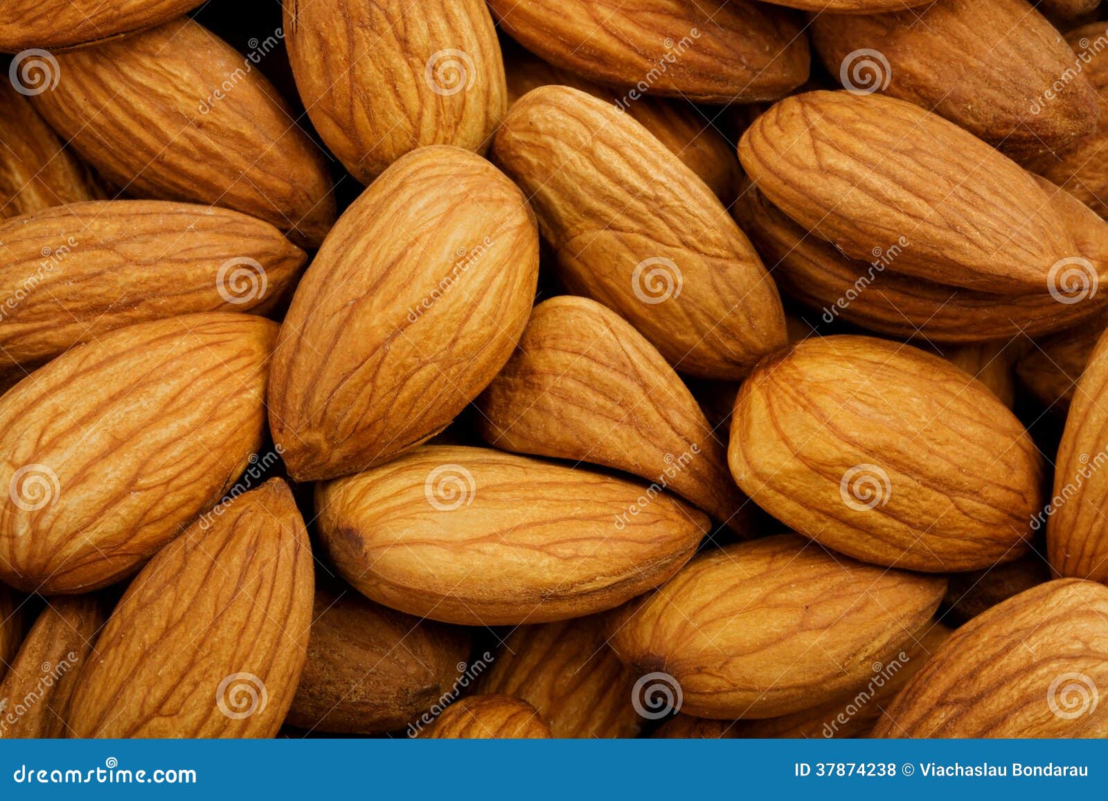 Closeup of Whole Almond Nuts Stock Photo - Image of scattered, group ...