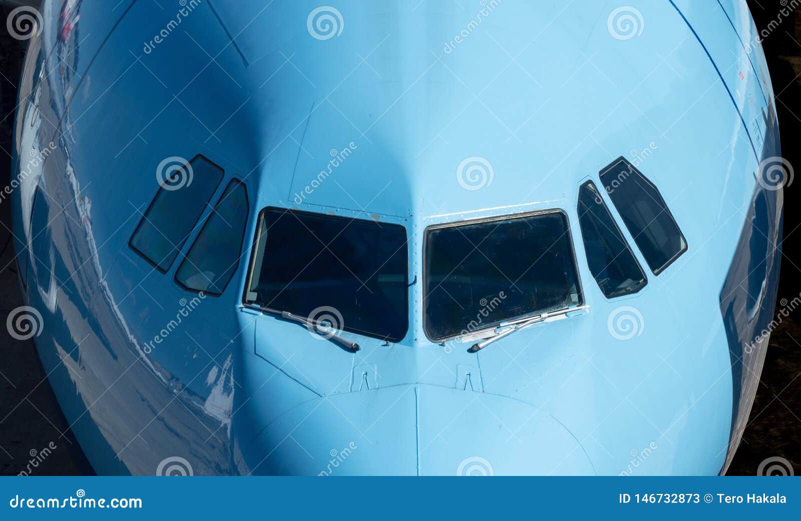 Closeup of the Windows of a Blue Airplane Cockpit Stock Image - Image ...