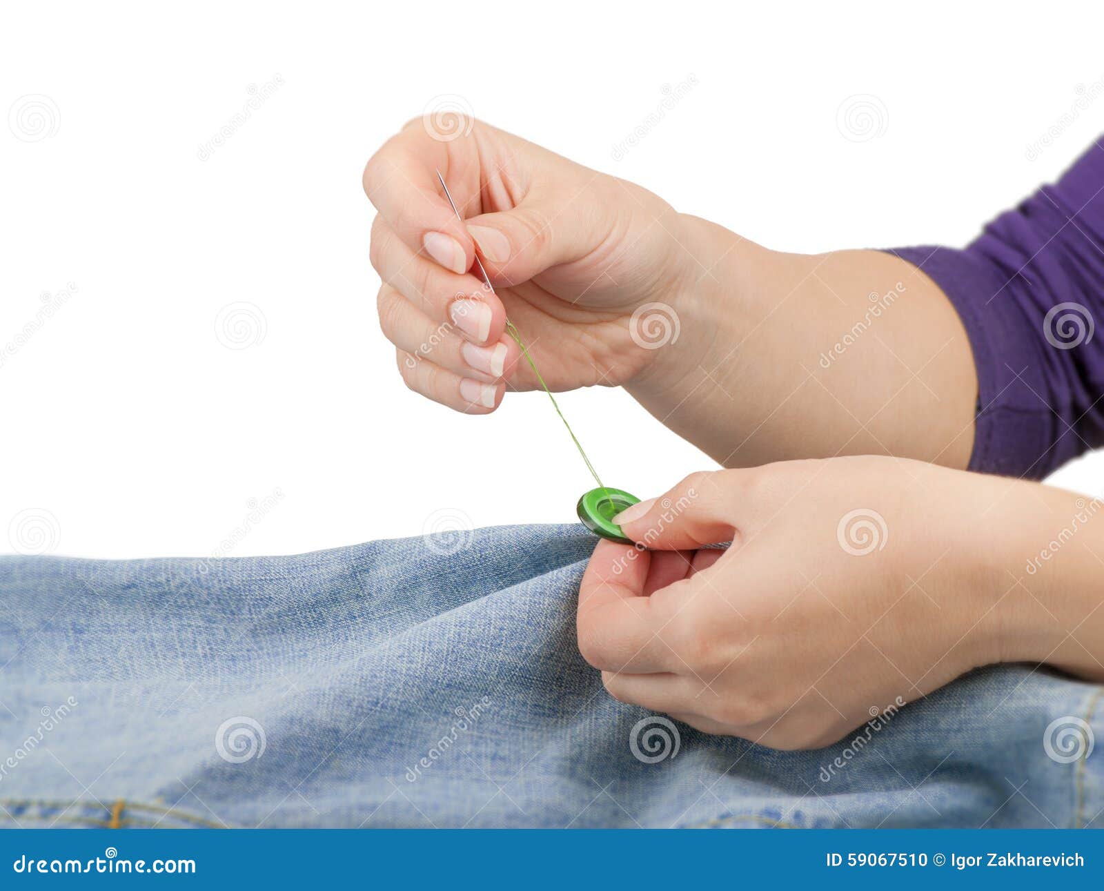 Hands Sewing With A Needle And Thread. Fingers Pulling Thread Into The ...