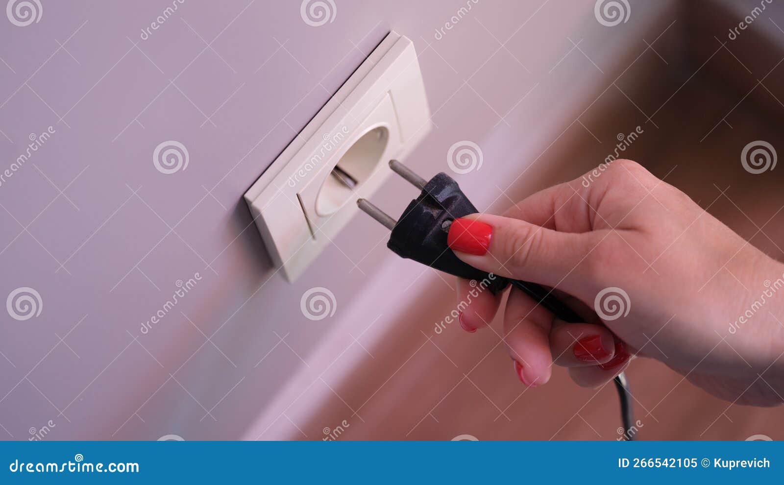 Closeup of Woman Holding in Hand Inserts Plug into Socket Stock Image ...