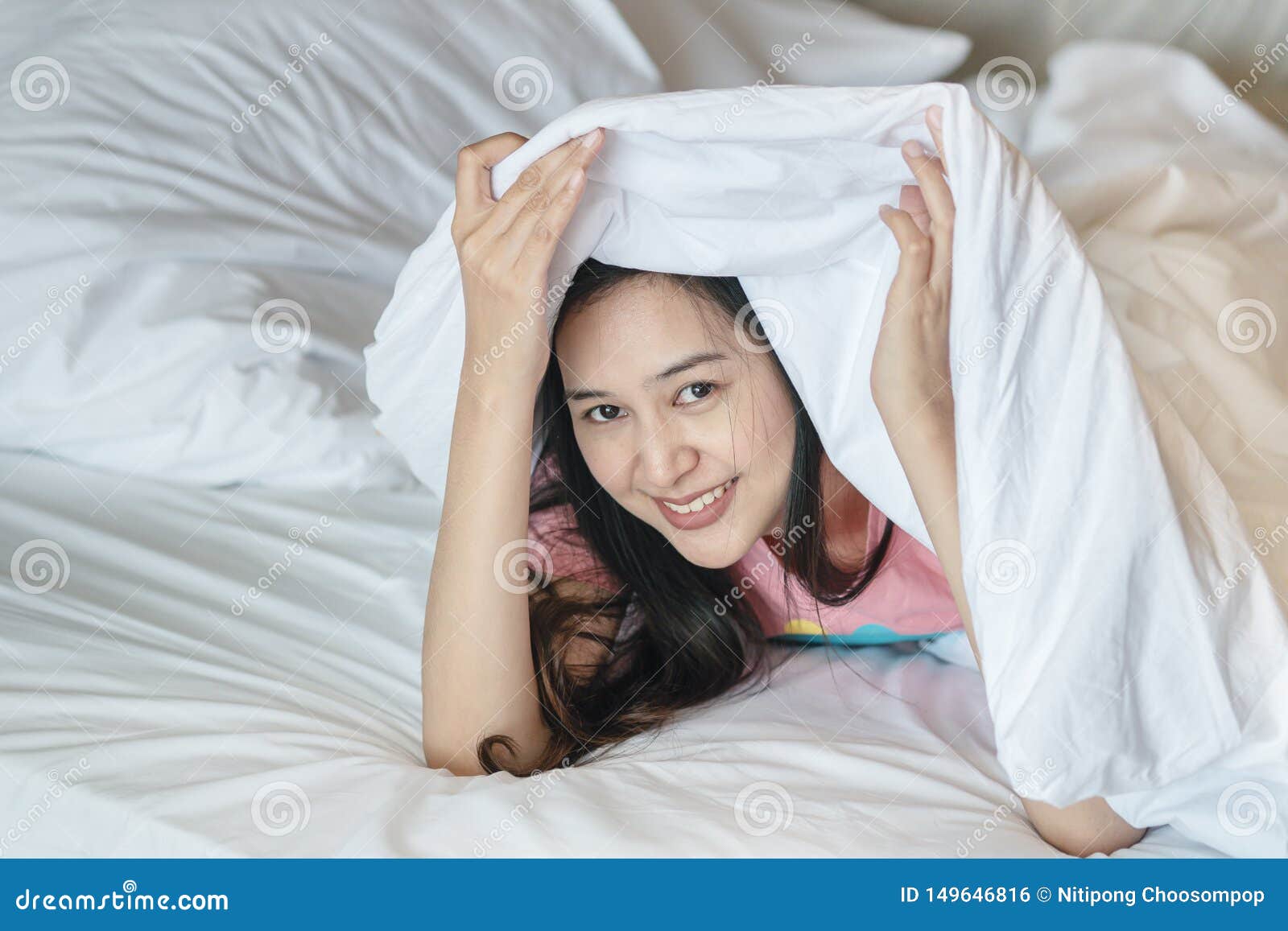 Closeup Asian Woman Lie On Bed Under Blanket With Smile Face In The