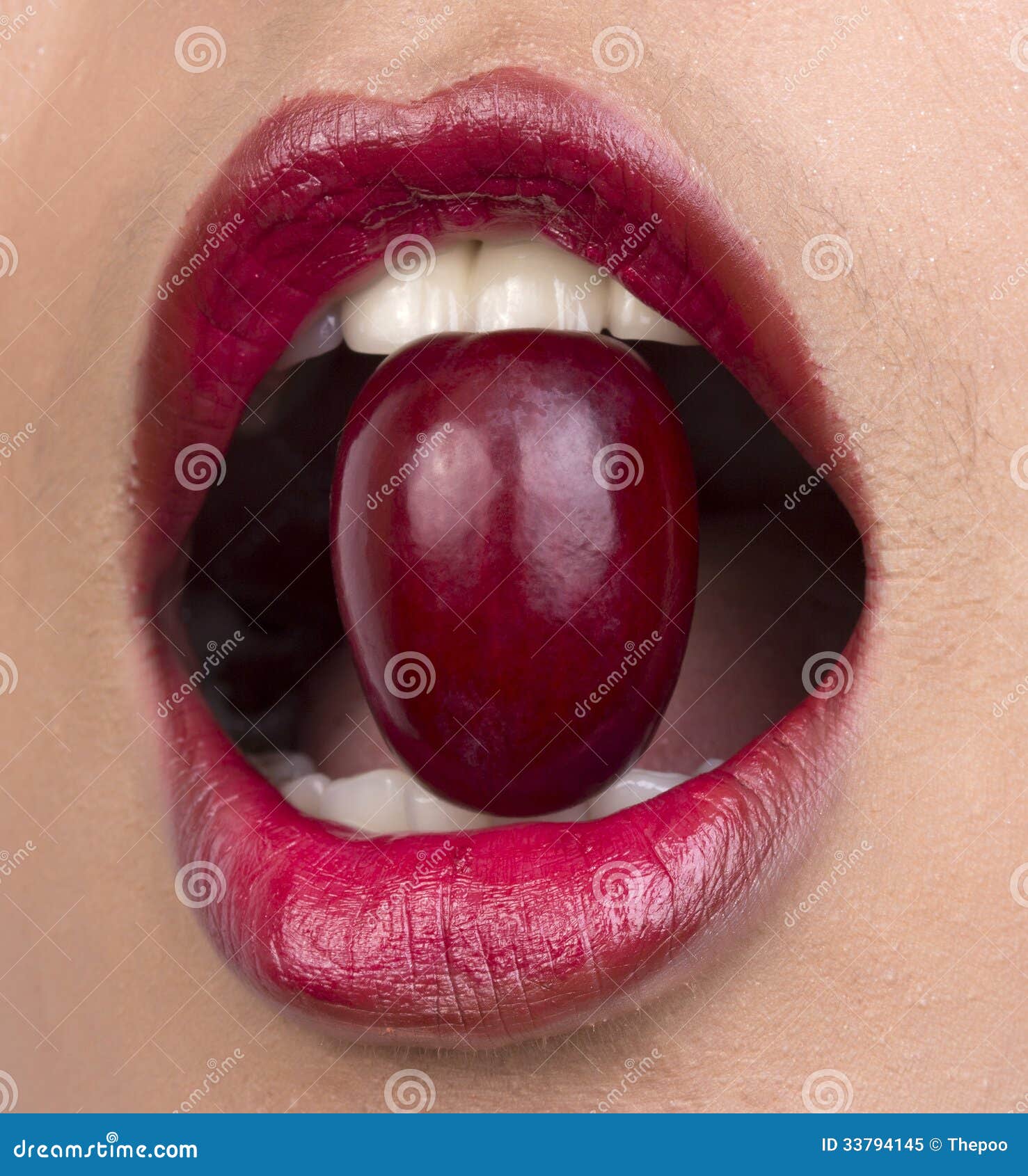 Closeup of Woman Mouth Eating Red Grape. Stock Image - Image of nature ...