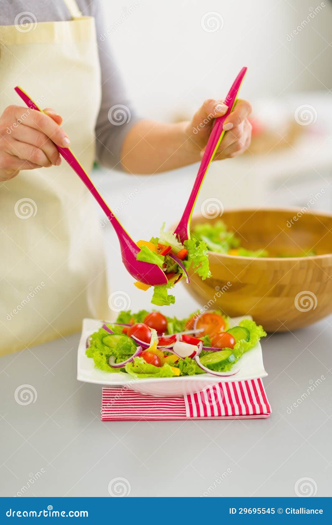 Closeup on Woman Putting Salad into Plate Stock Image - Image of dinner ...
