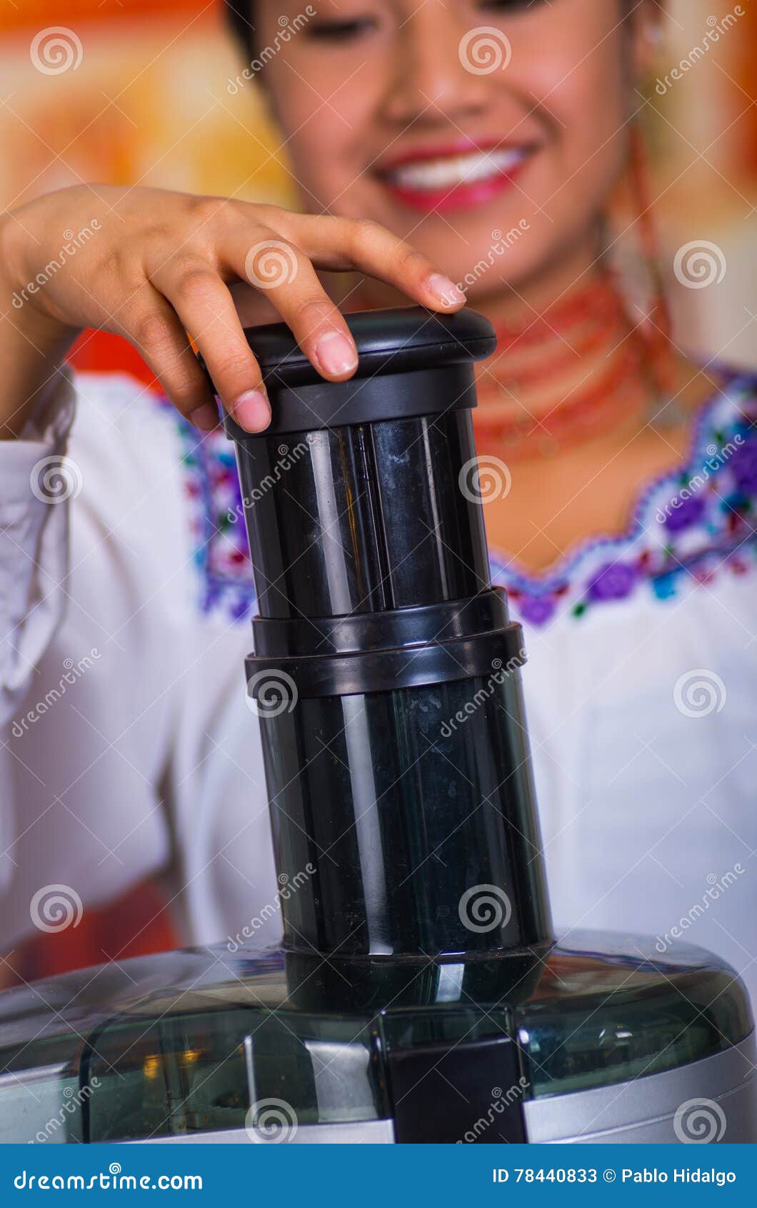 Closeup Woman S Hands Using Juice Maker Pressing Down Plastic Part Inserting Carrot Into