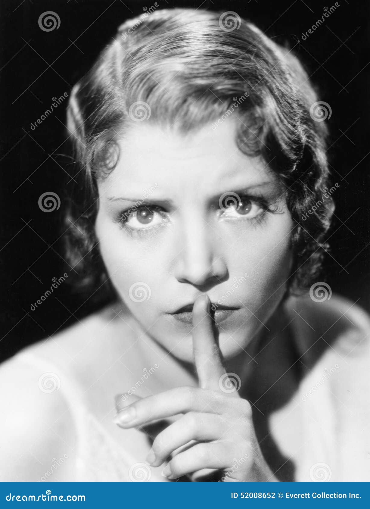 Closeup of woman shushing stock photo. Image of fashioned - 52008652