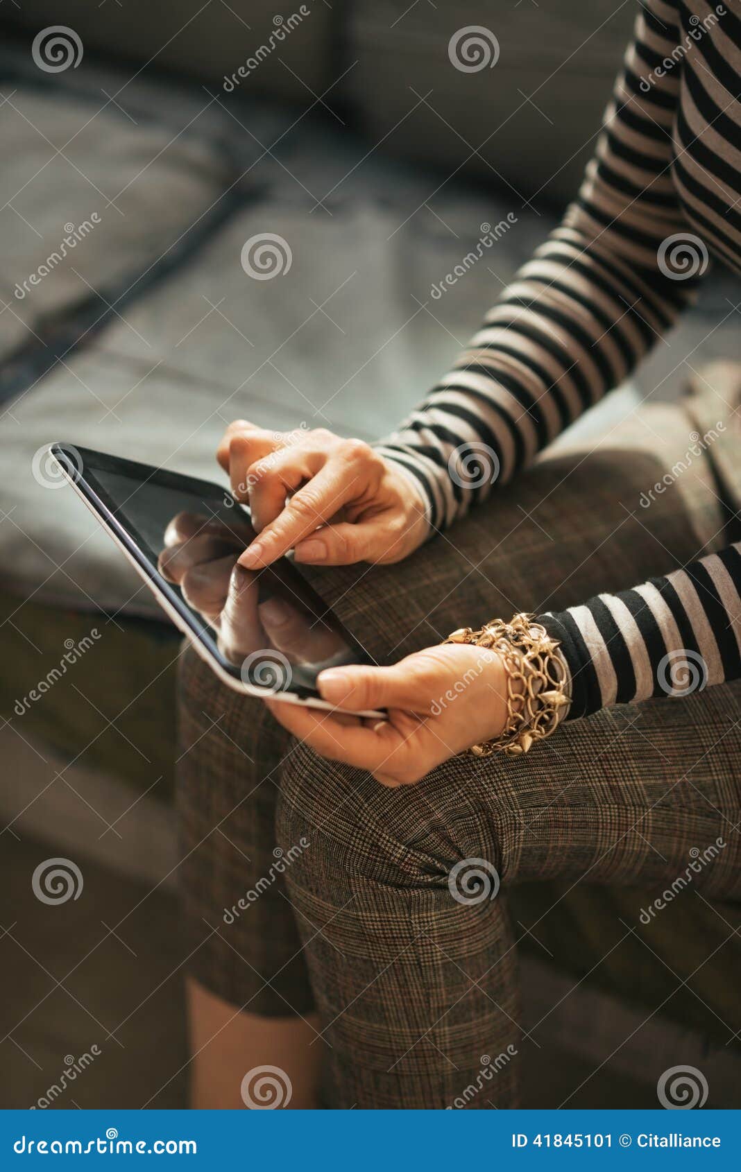 Closeup on Woman Sitting on Couch and Using Tablet Stock Image - Image ...