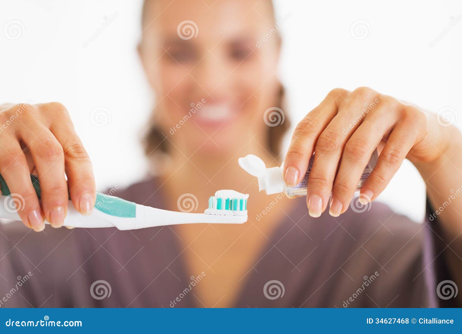 Closeup on Woman Squeezing Toothpaste from Tube Stock Photo - Image of ...