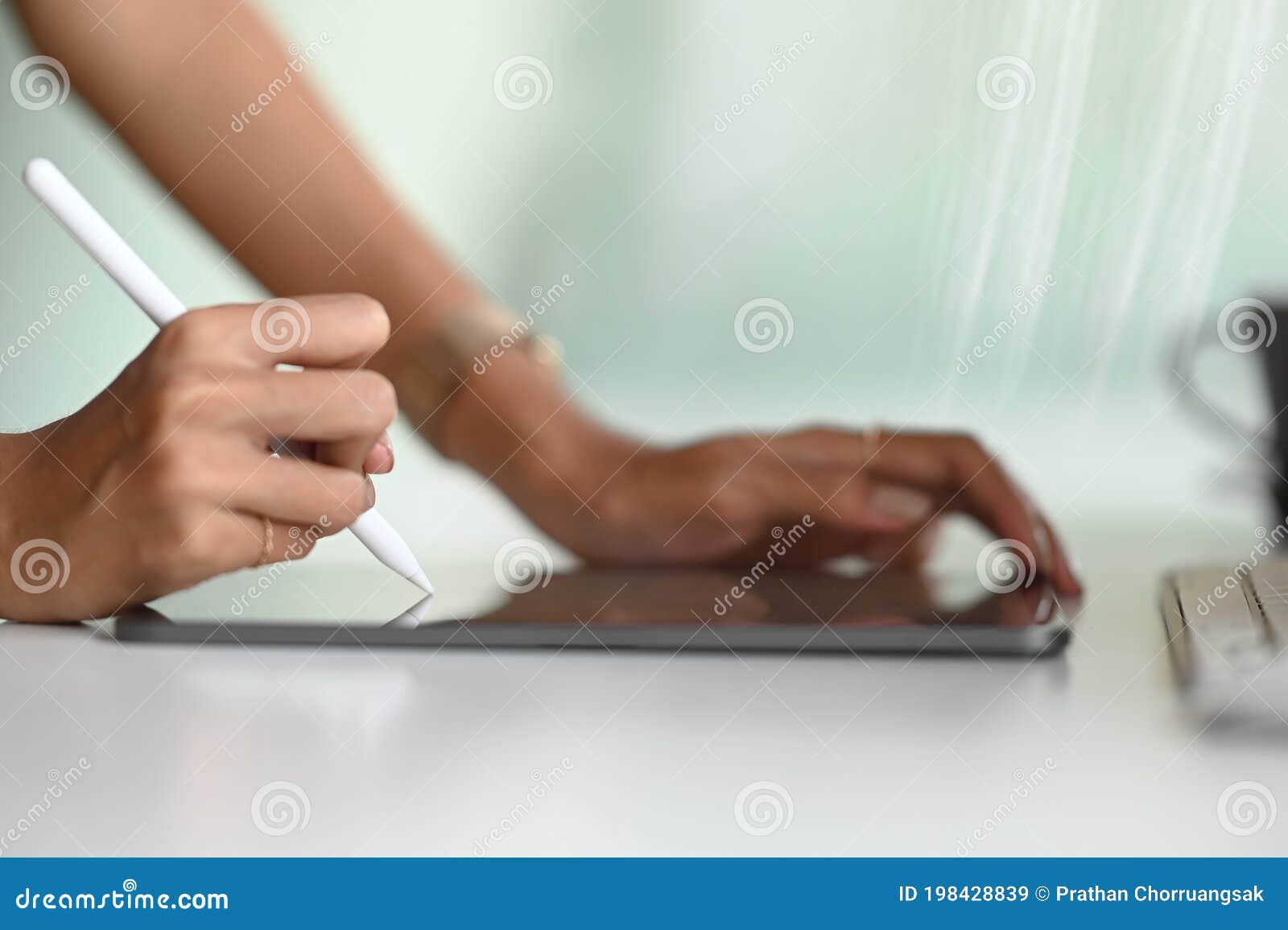 Closeup Woman Working on Digital Tablet Using Stylus Pen. Stock Image ...